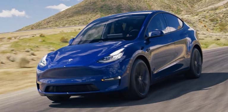 Tesla unveils Model Y as electric vehicle race heats up